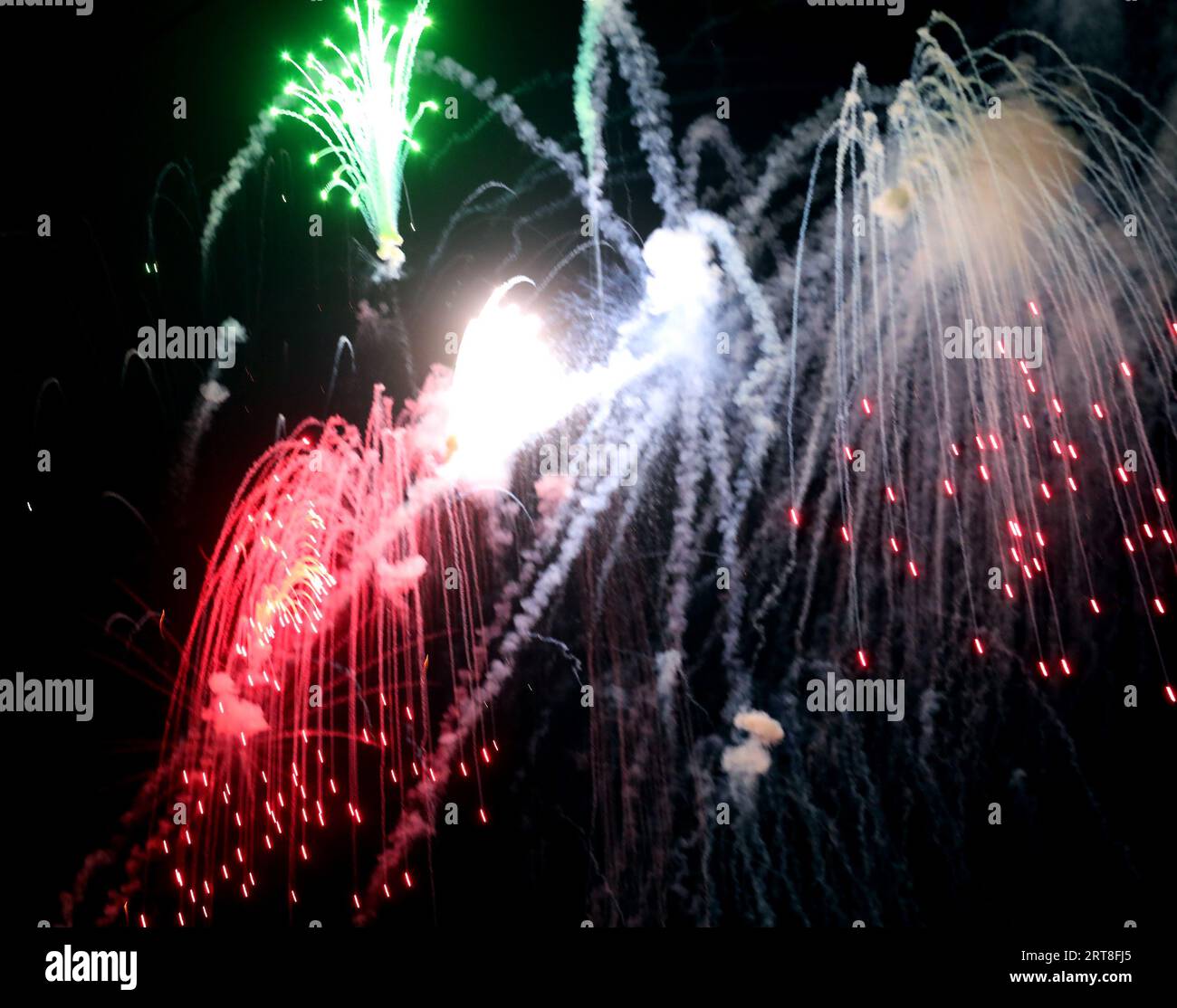 colorful explosions of huge fireworks during the festivities at night ...