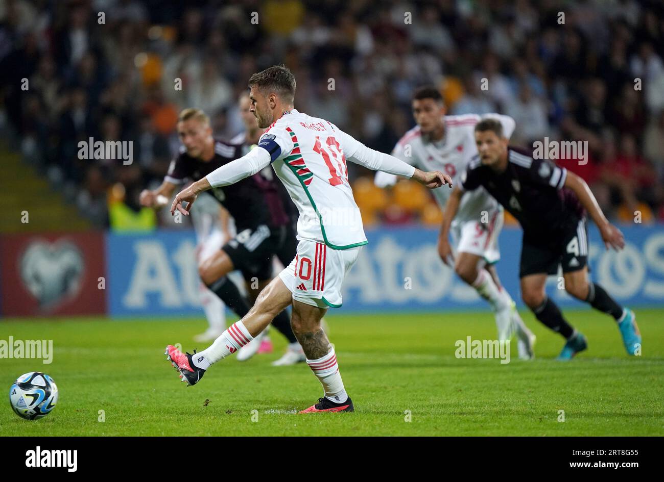 Wales' Aaron Ramsey scores their side's first goal of the game from a ...