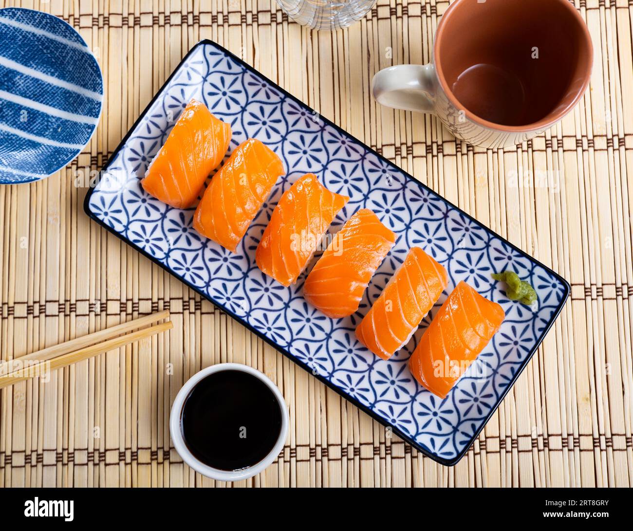 row salmon nigiri Stock Photo - Alamy