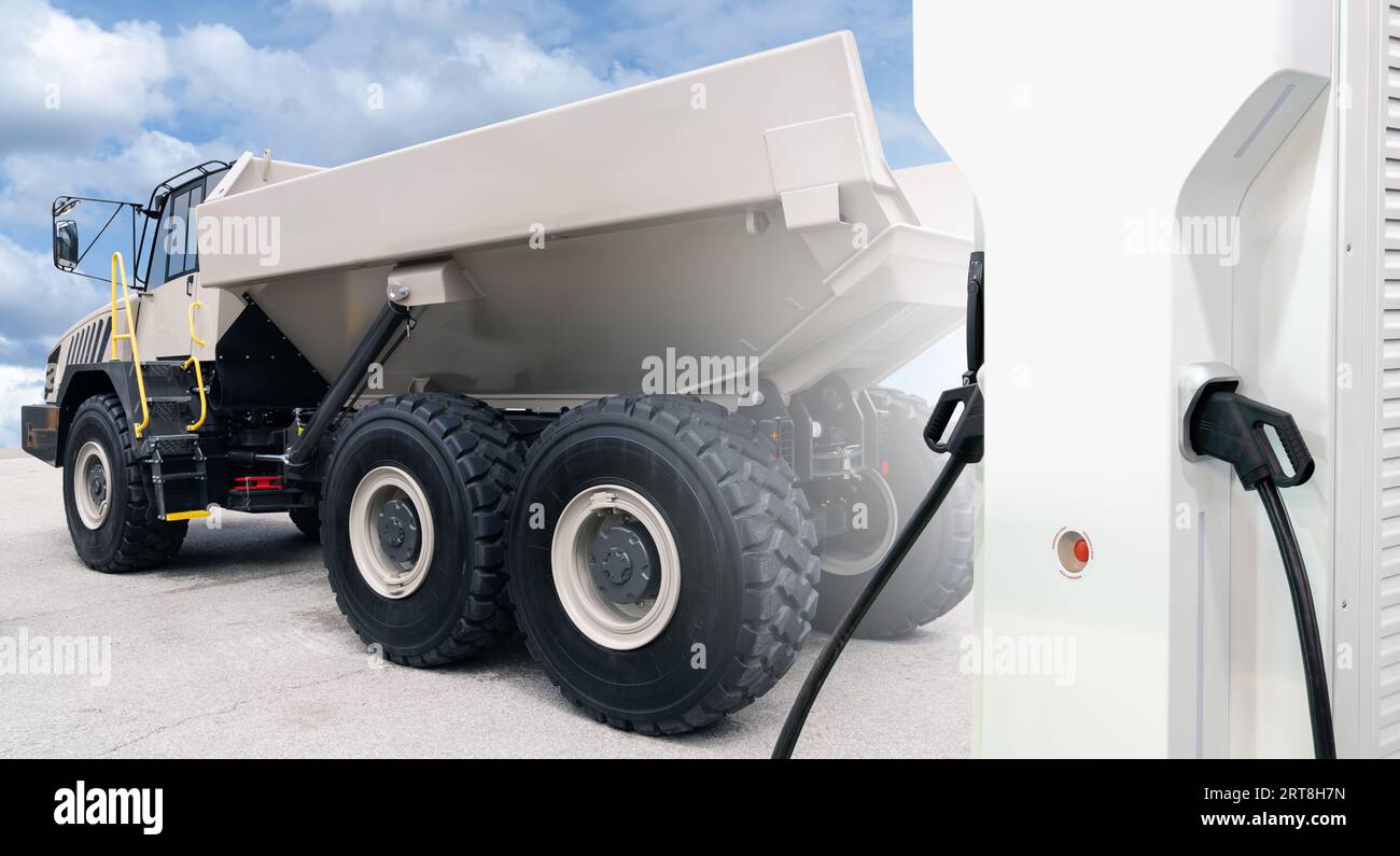Electric charging station on a background of electric mining truck ...