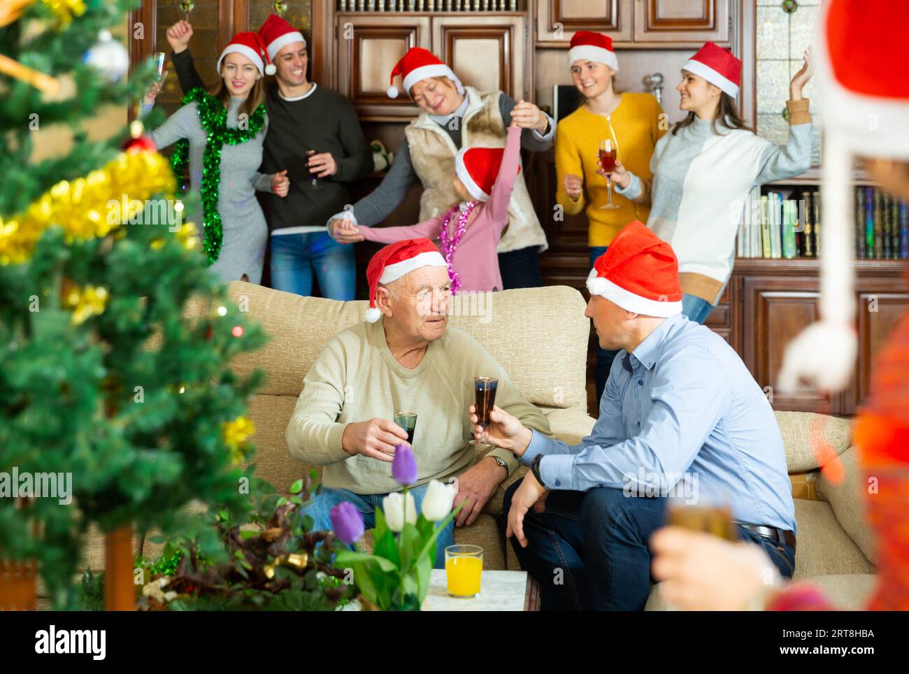 Big family gathering for Christmas celebration Stock Photo - Alamy