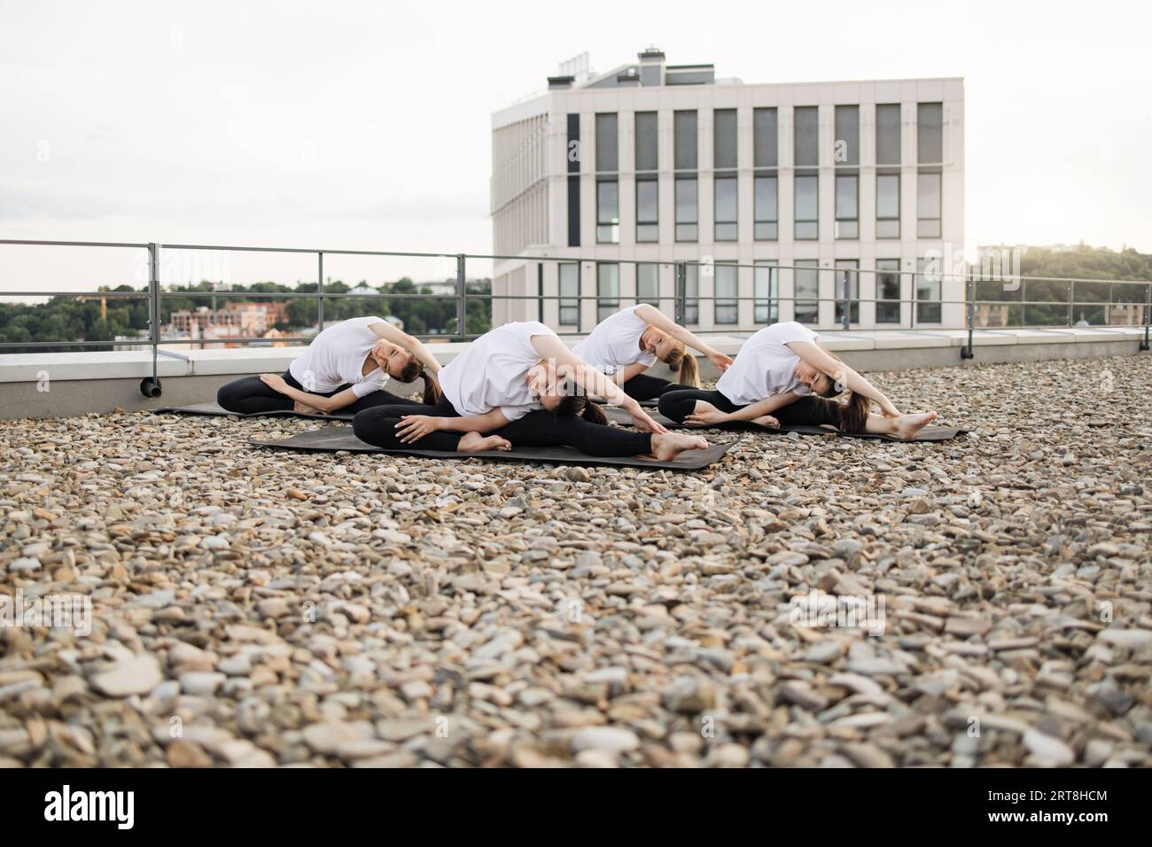 Rooftop yoga class hi-res stock photography and images - Alamy