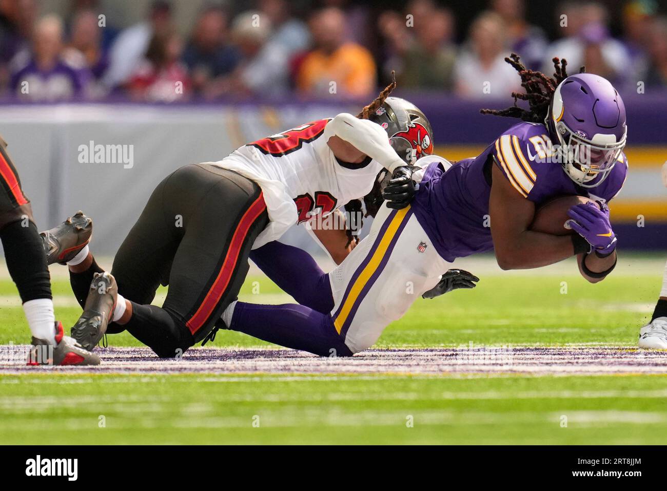 Minnesota Vikings running back Alexander Mattison (2) is tackled by ...