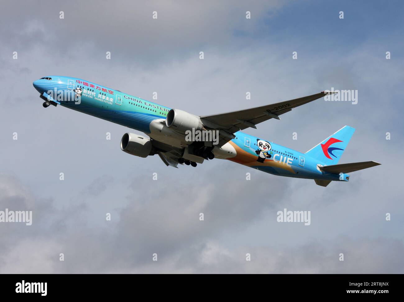 A Boeing 777-300 of China Eastern Airlines in a special CIIE livery ...