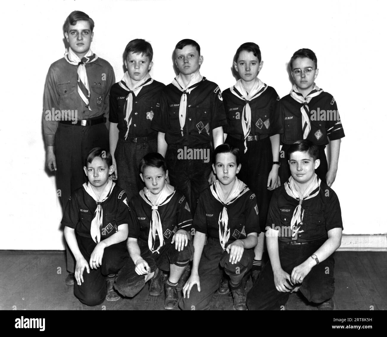 Members of an American Cub Scout den pose for a group photograph in the ...