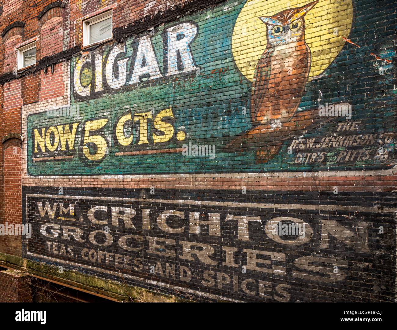 A ghost sign for 5-cent cigars was uncovered in Johnstown PA. Photo by ...