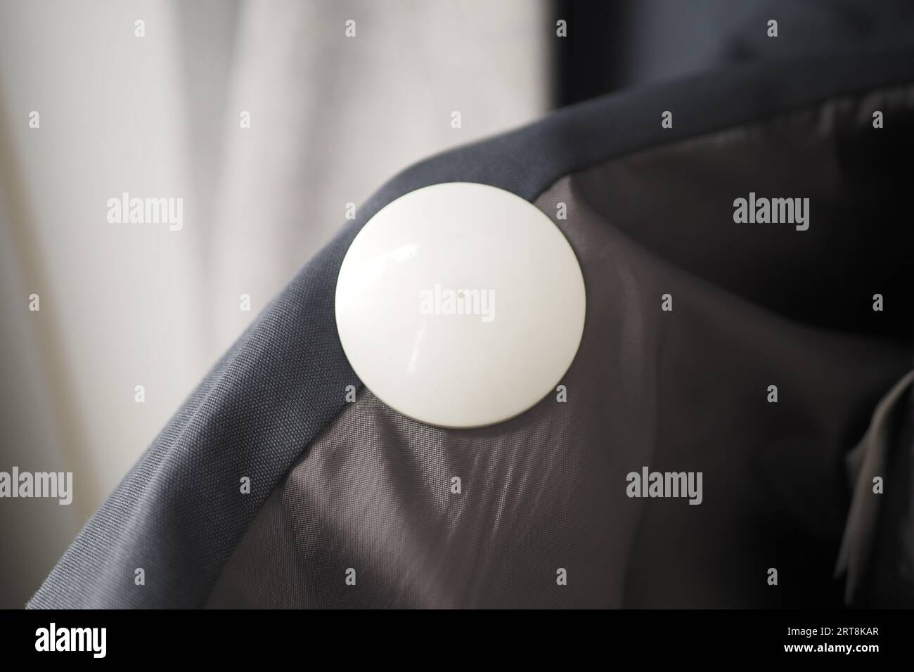 Security tags on clothes hi-res stock photography and images - Alamy