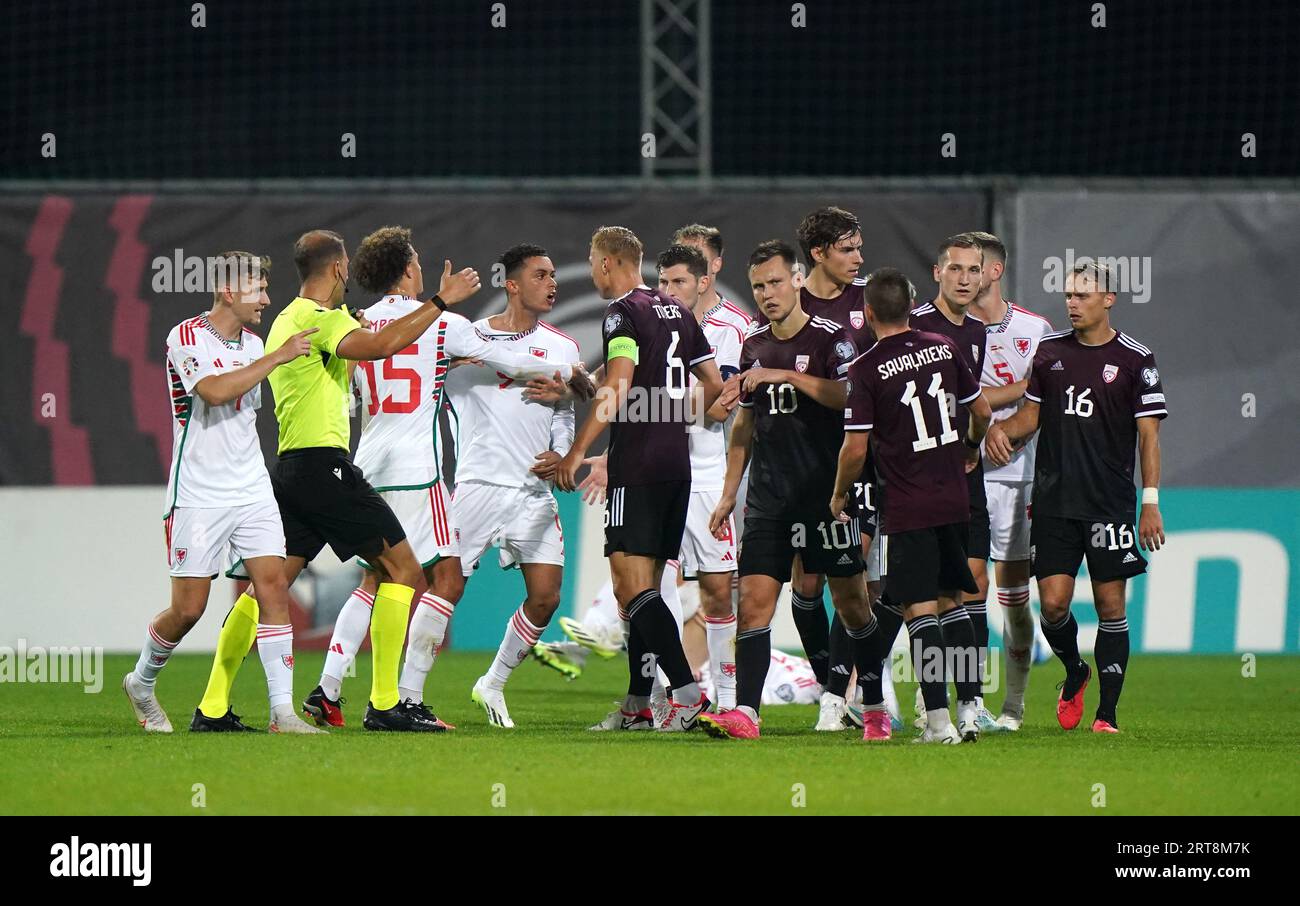 Tempers flare between Wales' Brennan Johnson and Latvia's Kristers ...