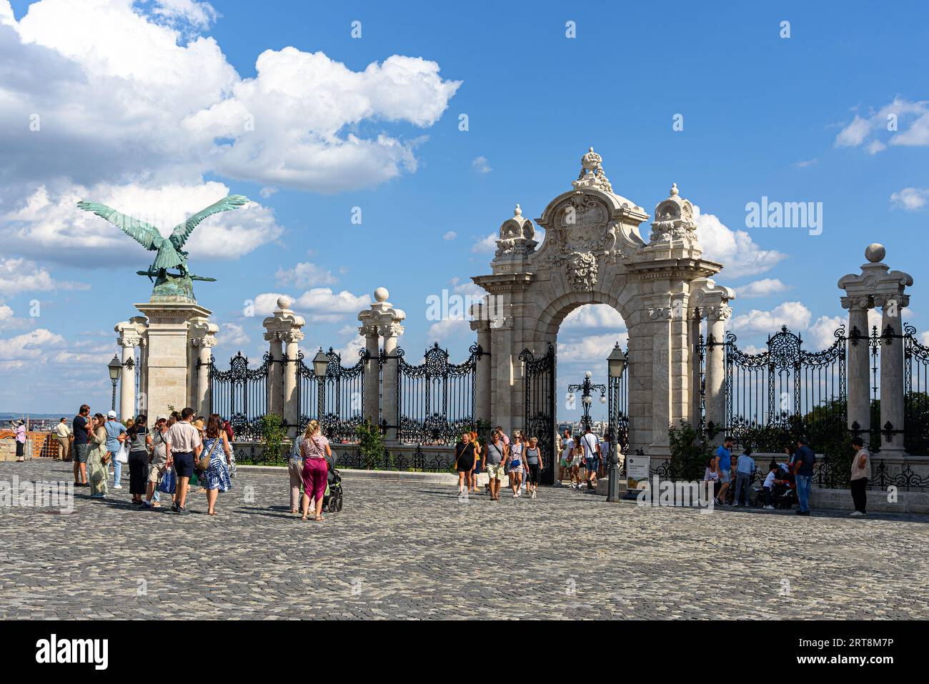 Tourists milling about before the Habsburg Gate in the Buda Castle ...