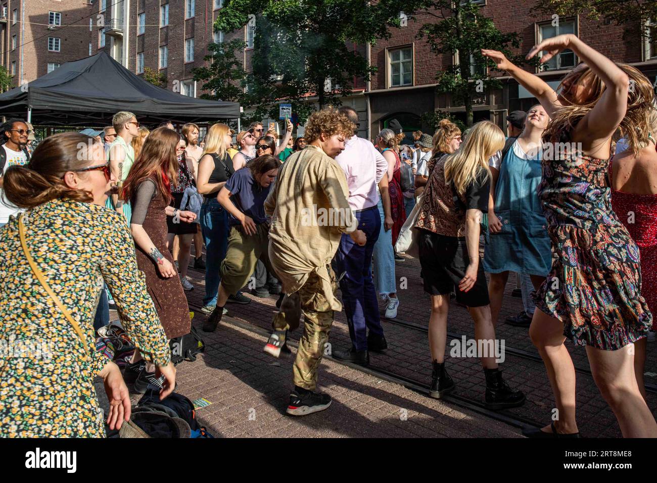 Young people dancing in the street at Kallio Block Party 2023 in ...