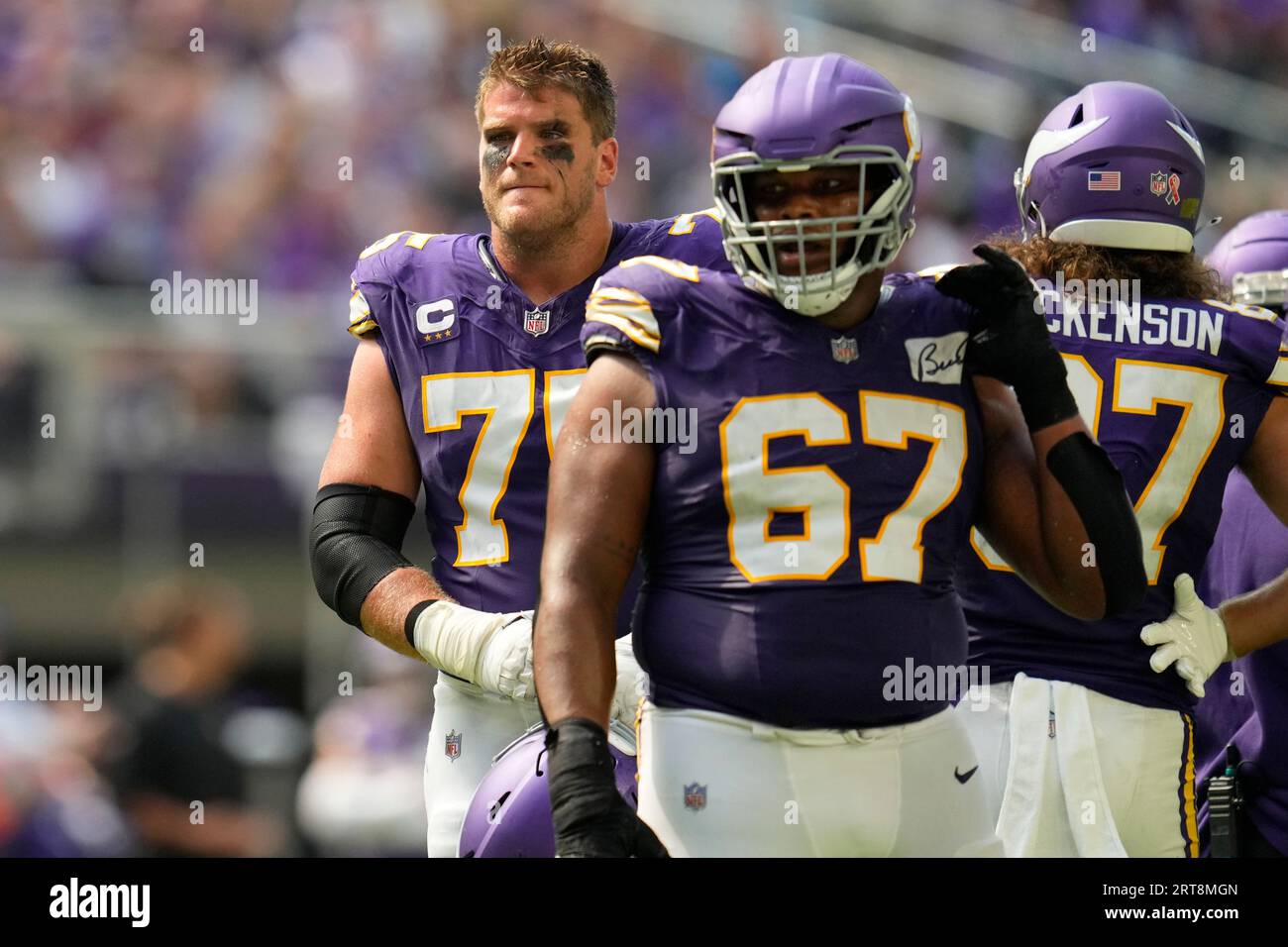Minnesota Vikings offensive tackle Brian O'Neill (75), left, and guard ...