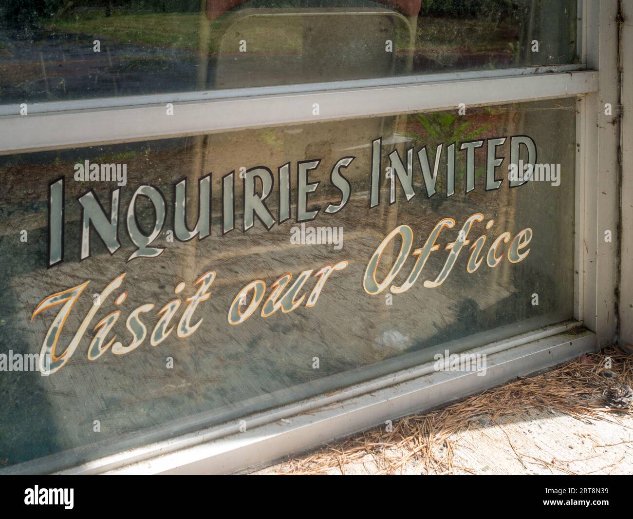 Abandoned funeral home sign Stock Photo - Alamy