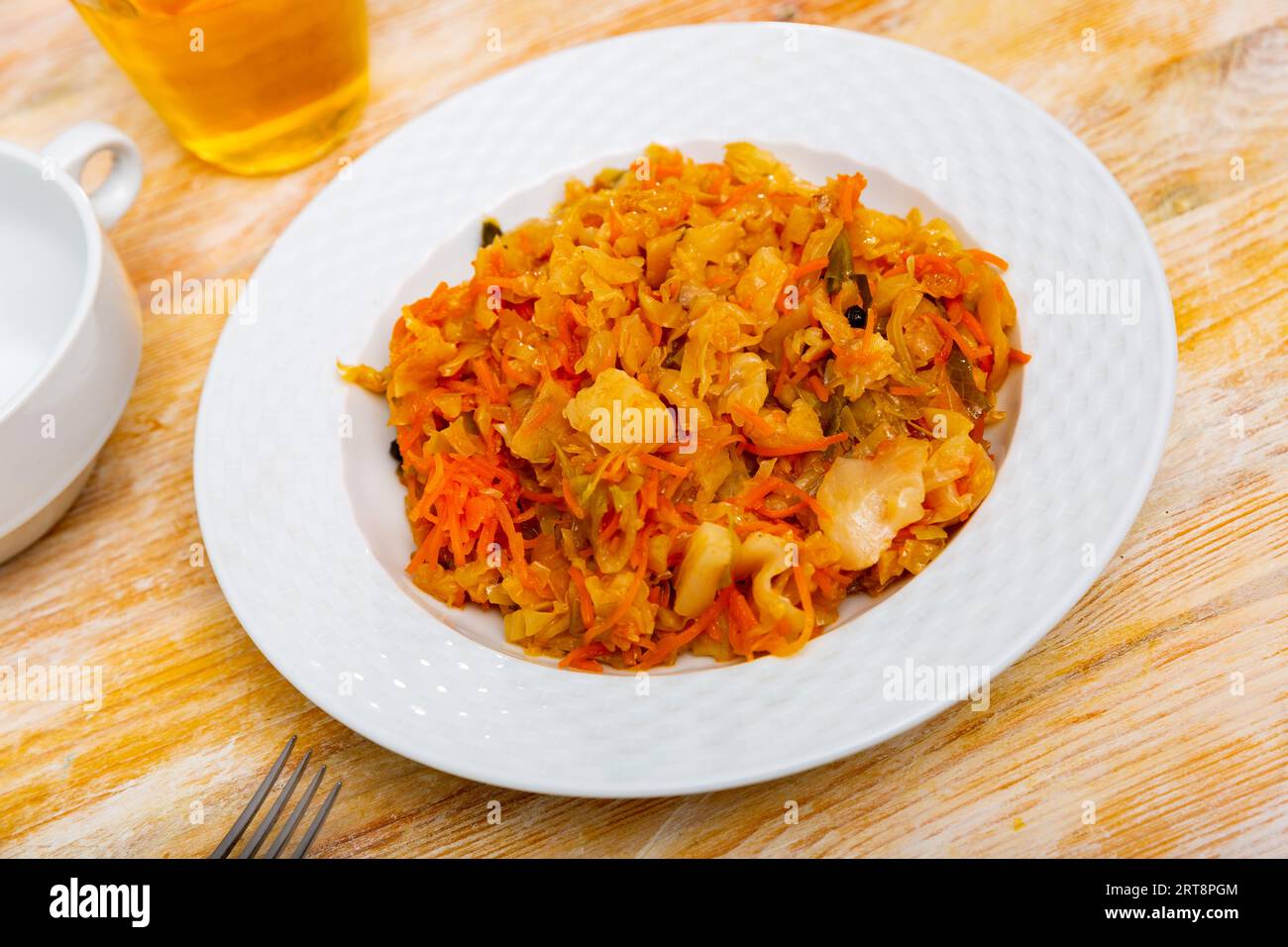 Spicy braised white cabbage as side dish or main course Stock Photo - Alamy