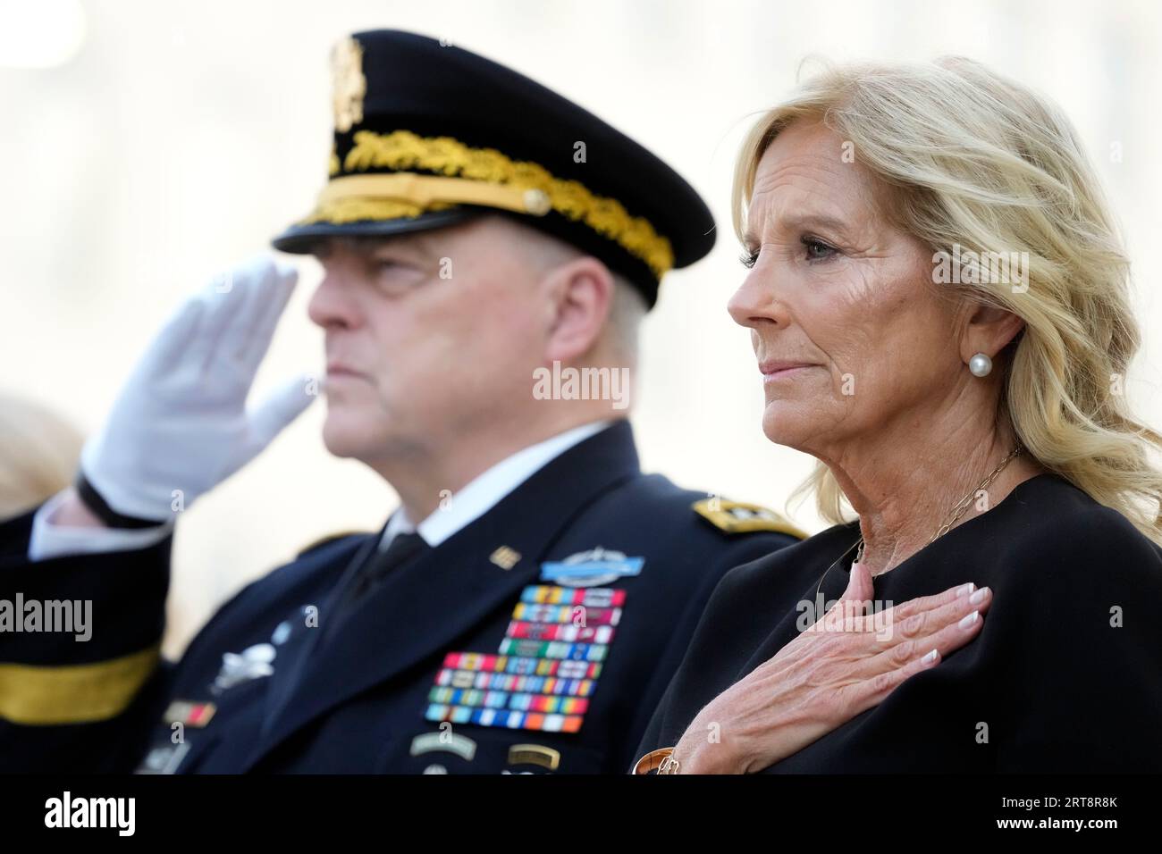 First lady Jill Biden pauses with Chairman of the Joint Chiefs of Staff ...