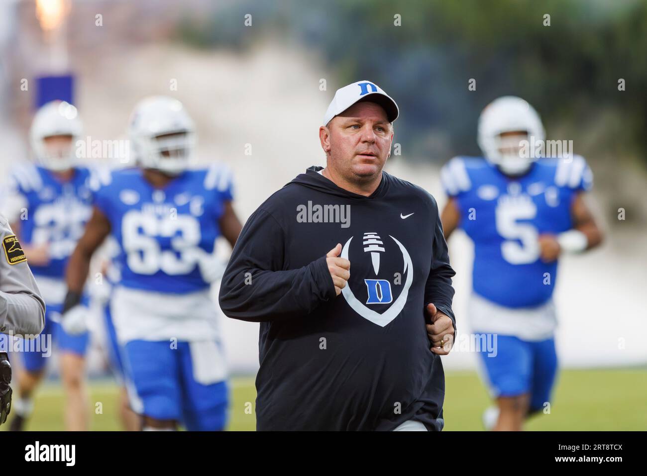Duke head coach Mike Elko runs onto the field before the start of an ...