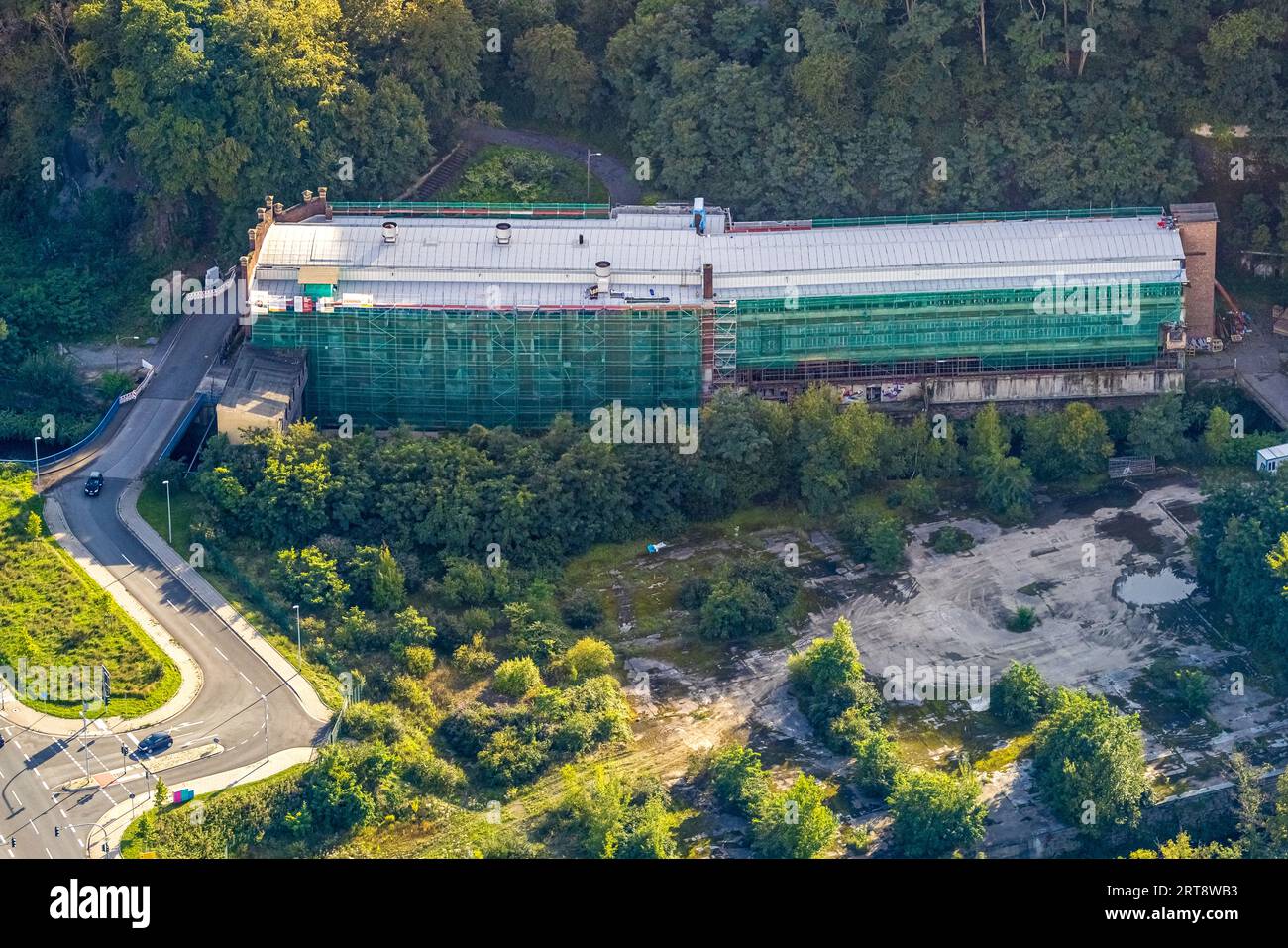 Construction site with shrouded facade hi-res stock photography and ...