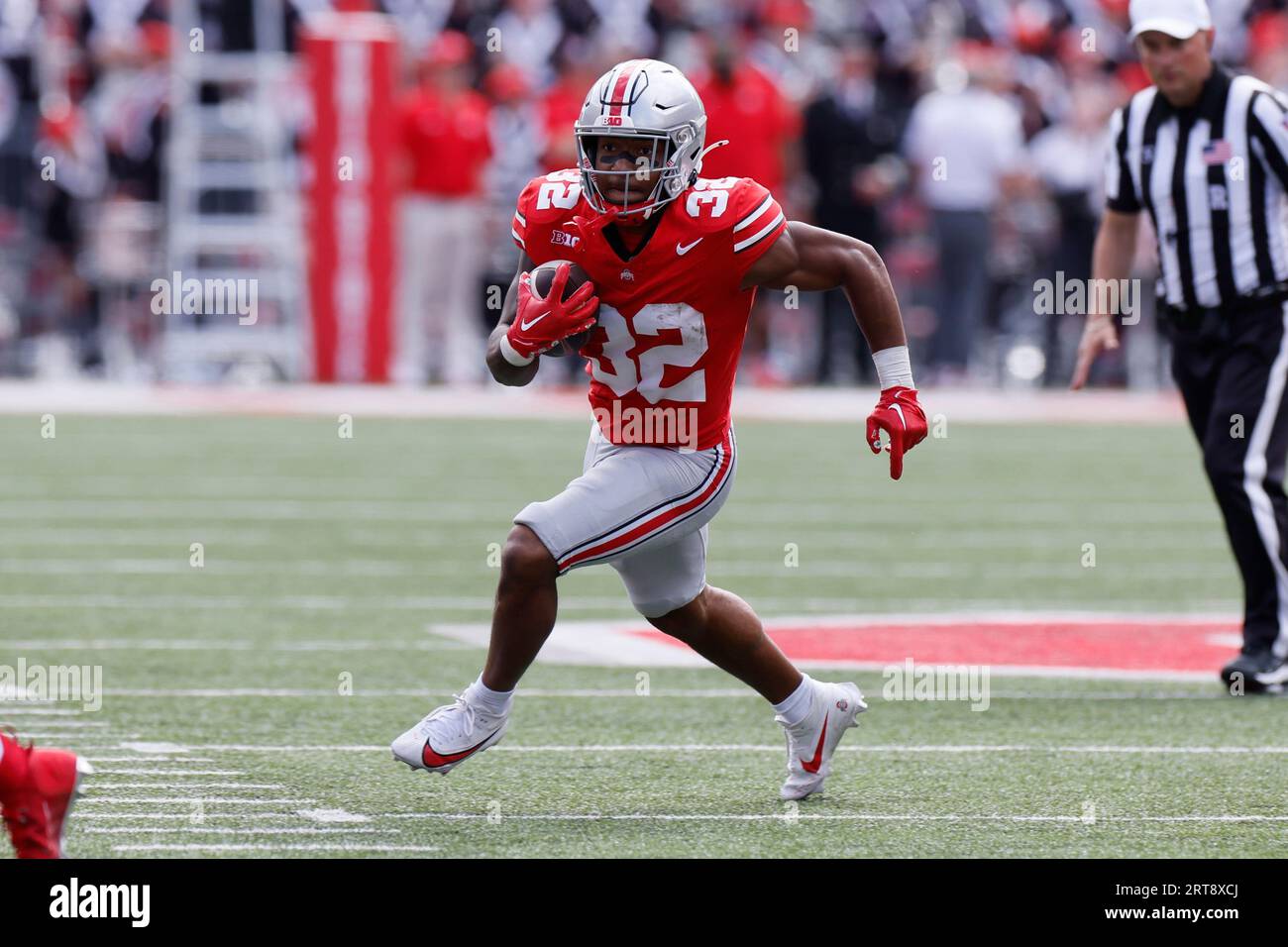 Ohio State running back TreVeyon Henderson plays against Youngstown ...