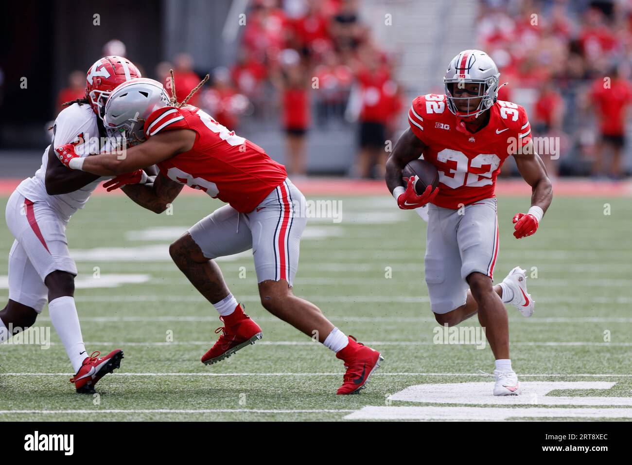 Ohio State running back TreVeyon Henderson plays against Youngstown ...