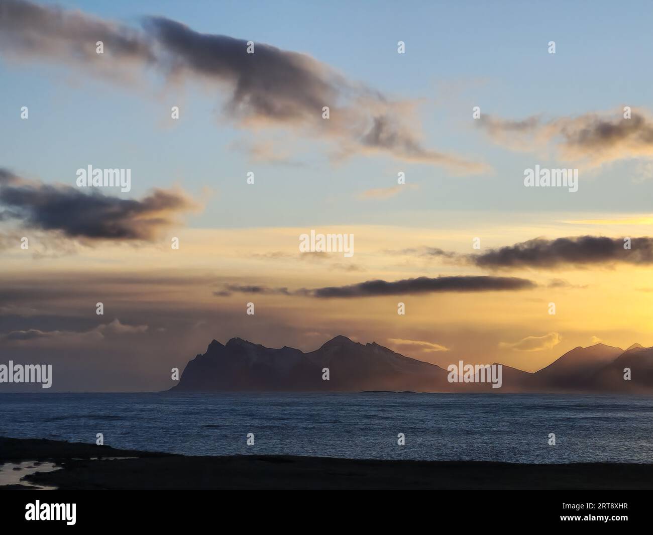 Icelandic frozen region during golden hour with snow covered ...