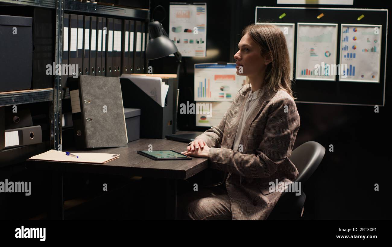 Caucasian Female Private Investigator Uses Advanced Technology To