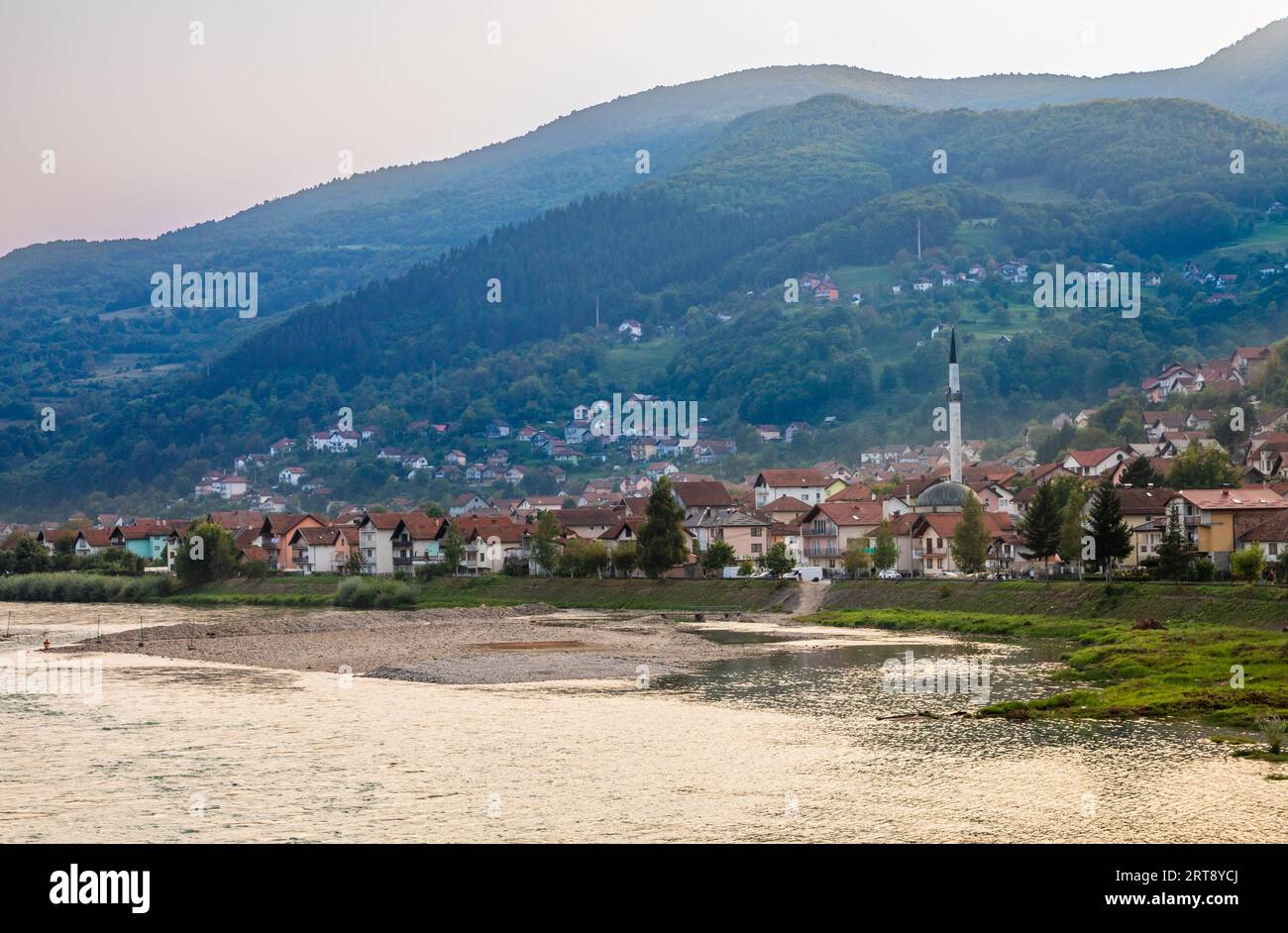 Gorazde residential district town panorama with mosque on the riverbank ...