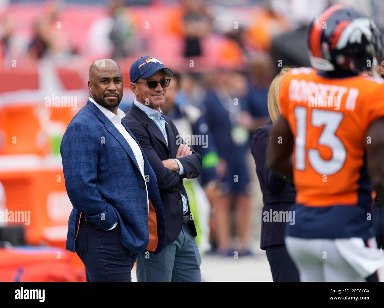Denver Broncos team president Damani Leech, front left, and co-owner ...