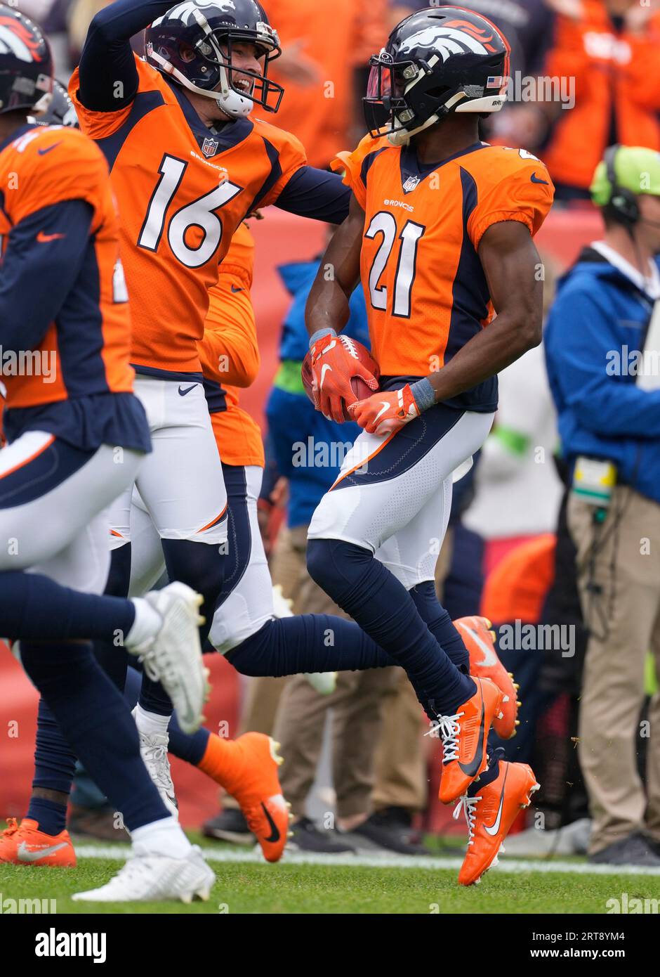 Denver Broncos place kicker Wil Lutz (16) celebrates with cornerback ...
