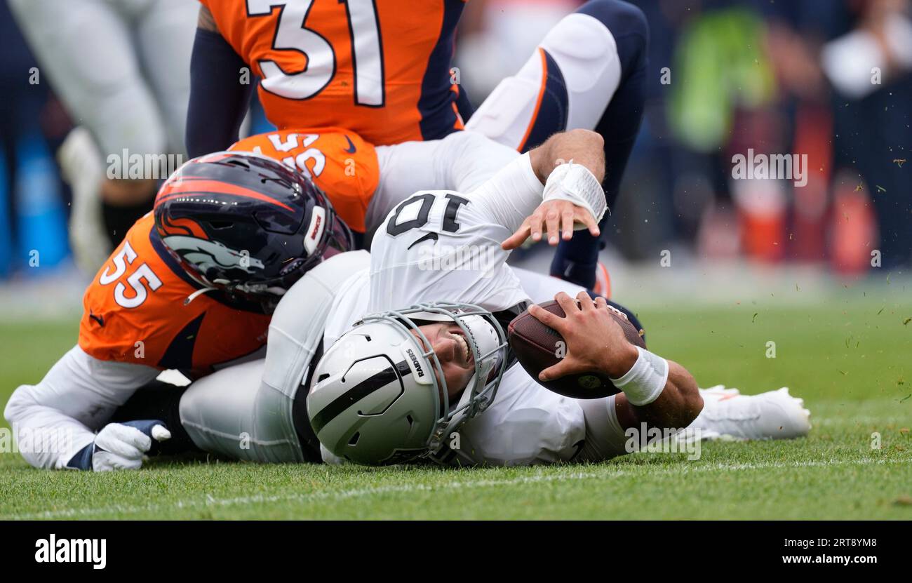 Denver Broncos linebacker Frank Clark (55) tackles Las Vegas Raiders ...