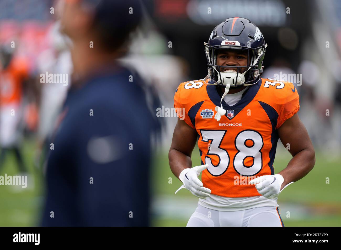 Denver Broncos running back Jaleel McLaughlin (38) warms up before the ...
