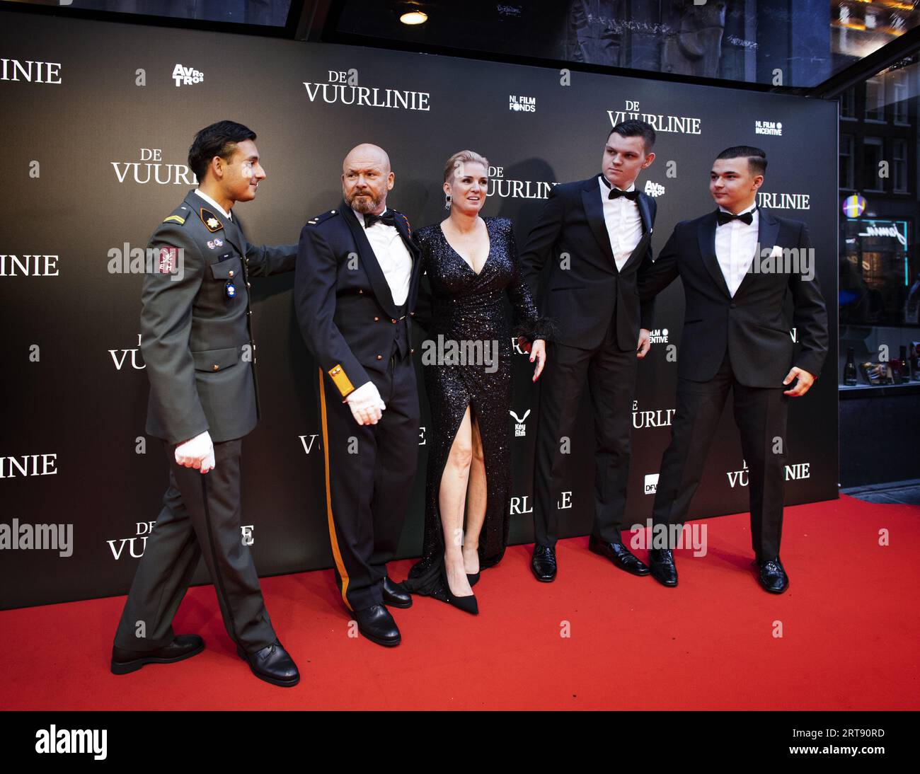 AMSTERDAM - Marco Kroon and Mirjam van den Hoven with their sons on the ...