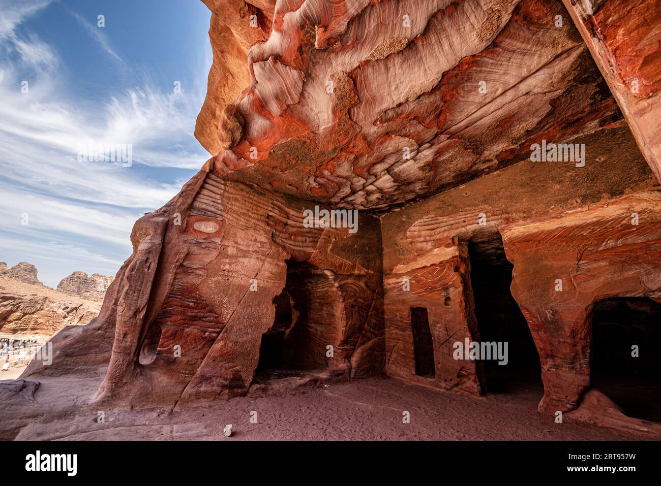 Colorful variegated rocks in carved tombs, Petra archaeological site ...
