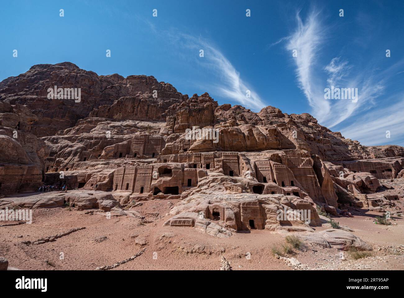Rock-cut buildings in Petra archaeological site, Jordan Stock Photo - Alamy