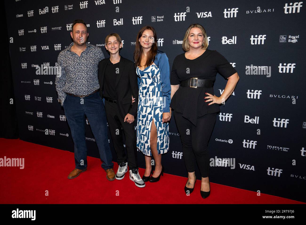 Actor Cameron Nicoll, second from left, poses for a photo with dad ...
