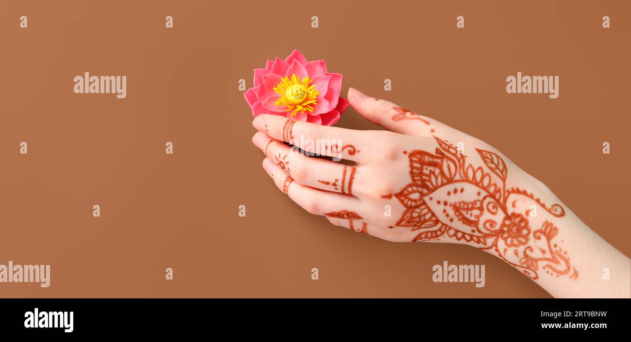 Hand holding lotus flower hi-res stock photography and images - Alamy