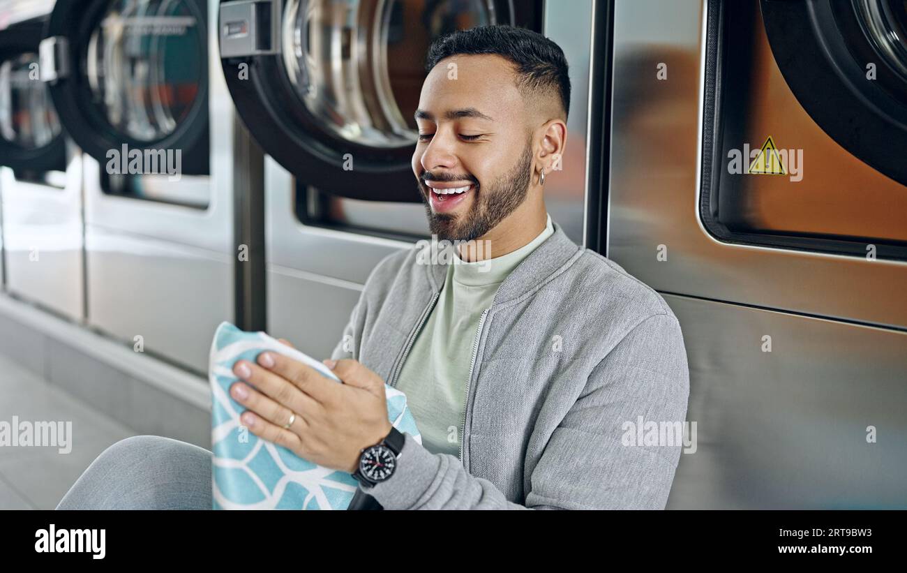 Sitting man portrait smelling hi-res stock photography and images - Alamy