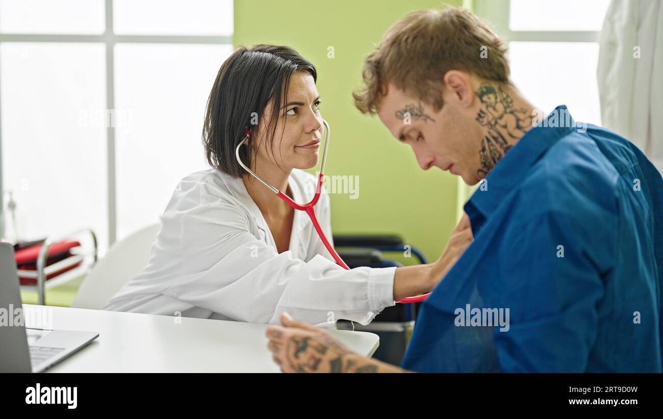 Doctor examining chest to patient using stethoscope at the clinic Stock ...