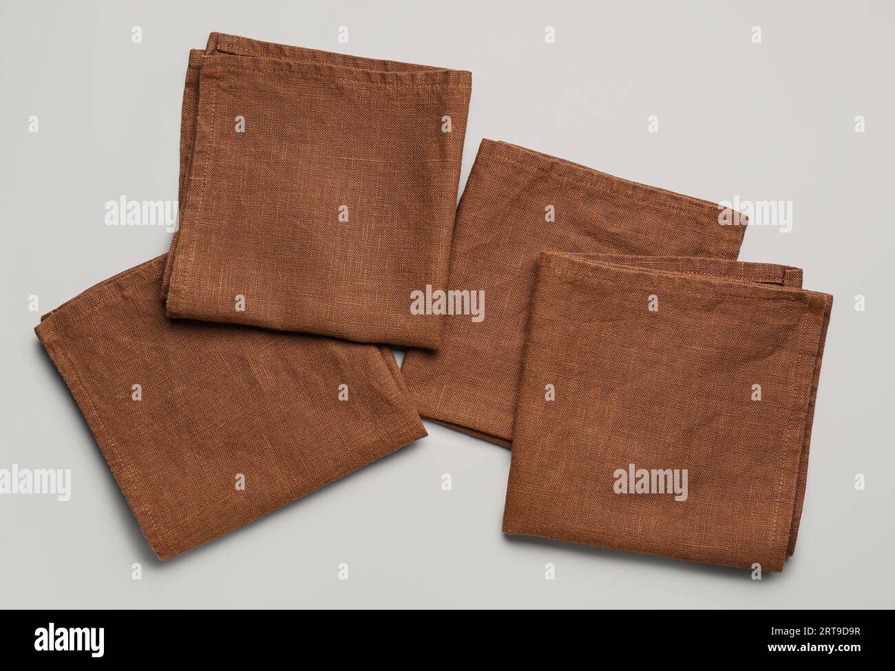Set of clean napkins on grey background Stock Photo - Alamy