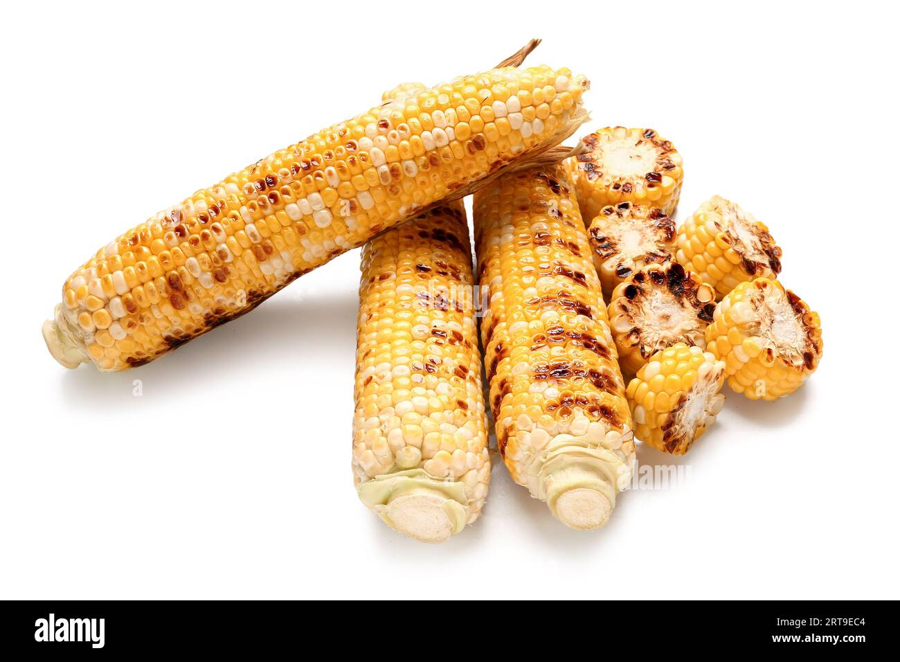 Tasty grilled corn cobs on white background Stock Photo - Alamy