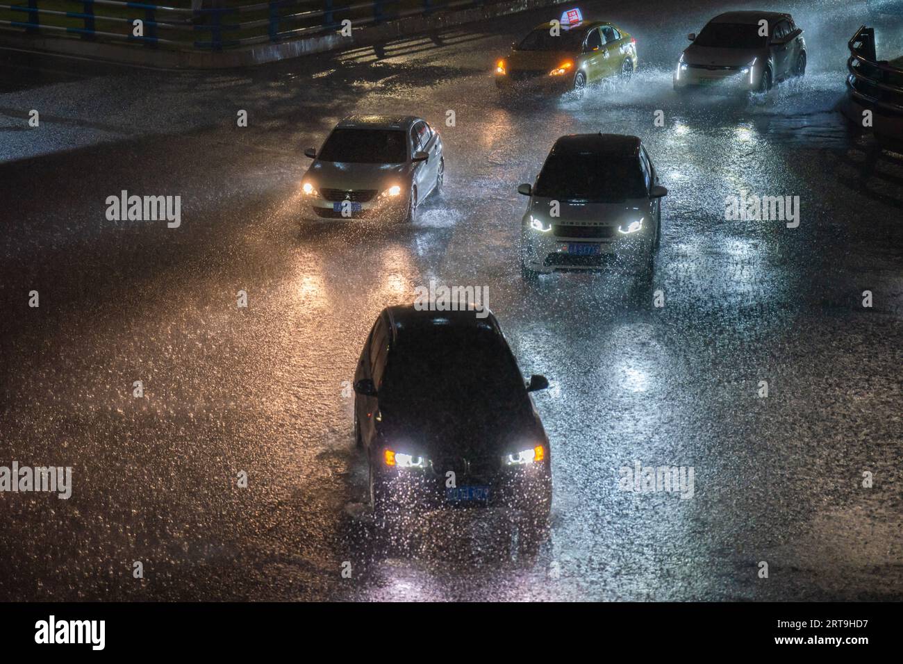 CHONGQING, CHINA - SEPTEMBER 11, 2023 - Vehicles drive in the rain in ...