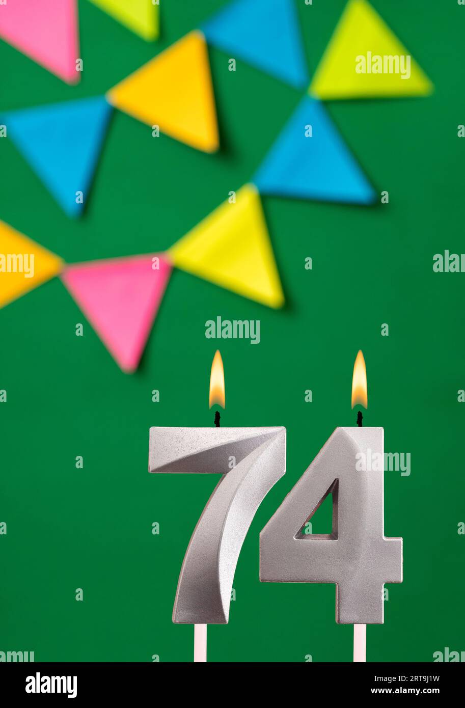 Vertical birthday card with number 74 candle - Green background with ...