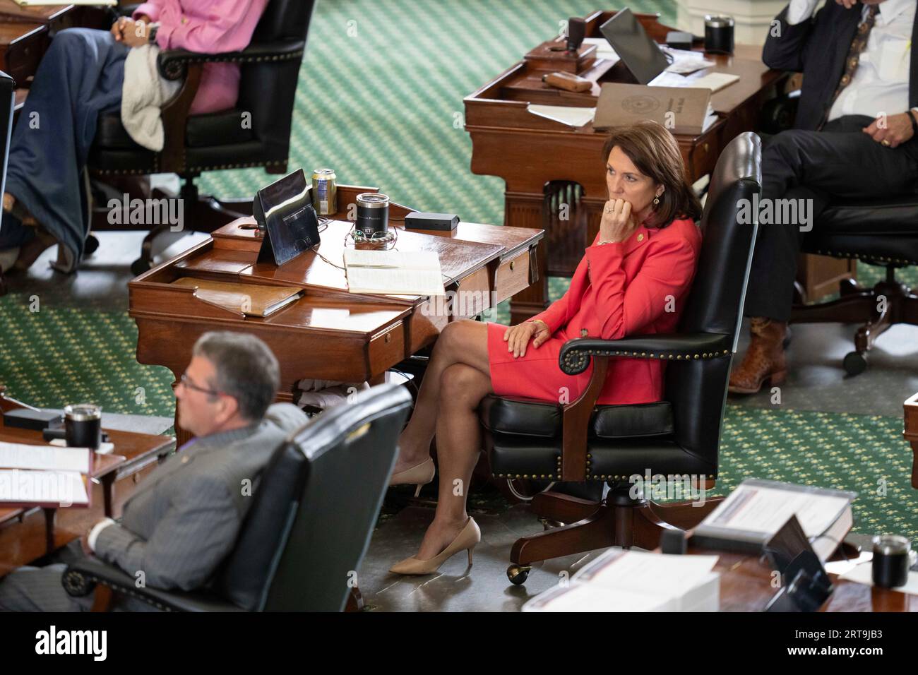 Angela paxton wearing red suit hi-res stock photography and images - Alamy