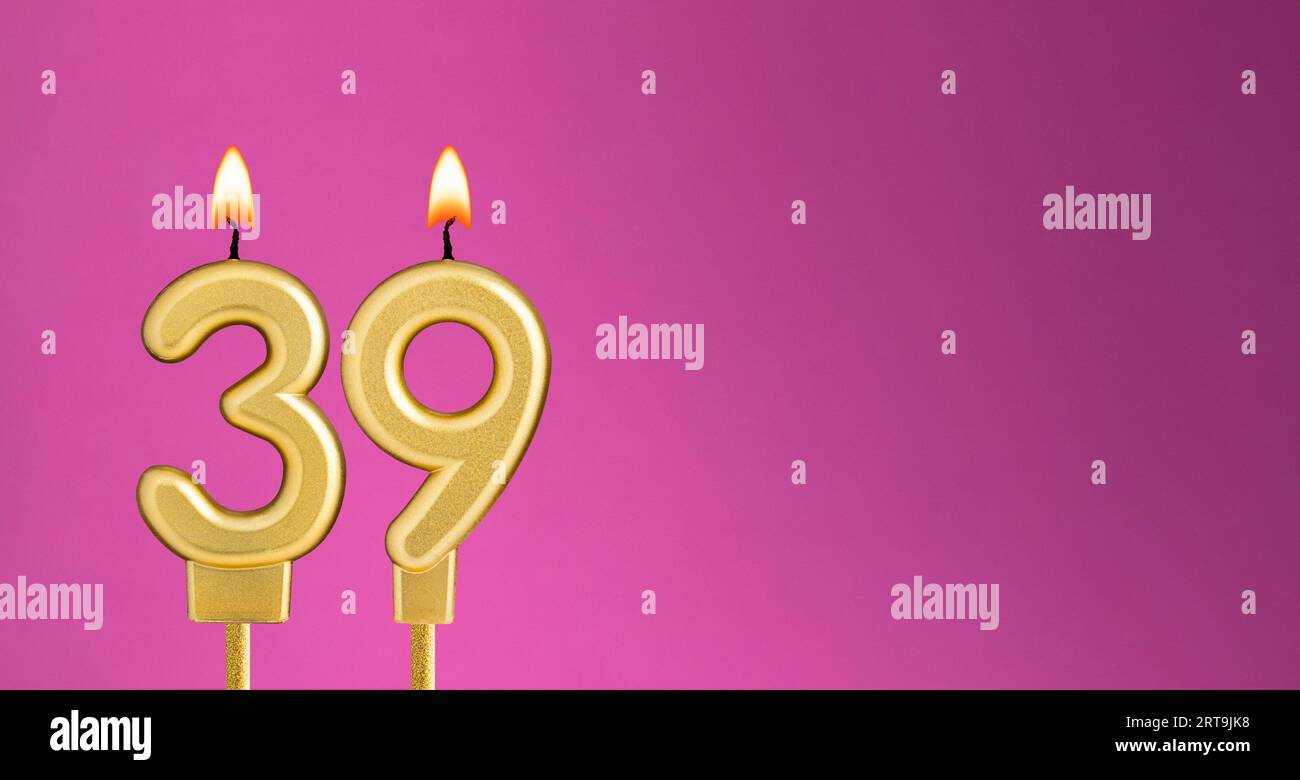 Candle number 39 in purple background - birthday card Stock Photo - Alamy