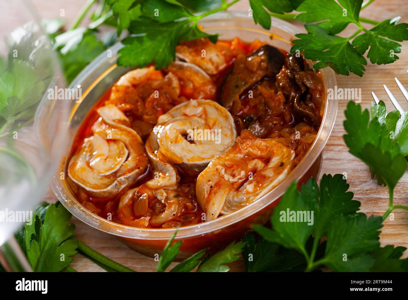 Marinated herring fillet in hunting style Stock Photo - Alamy