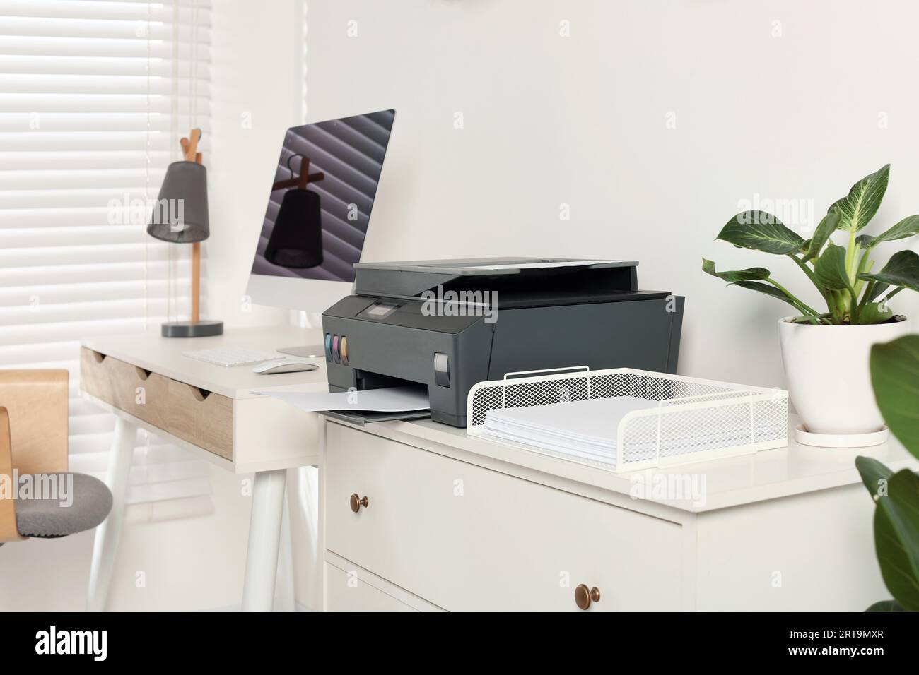 Stylish workplace with modern computer, printer and lamp Stock Photo ...