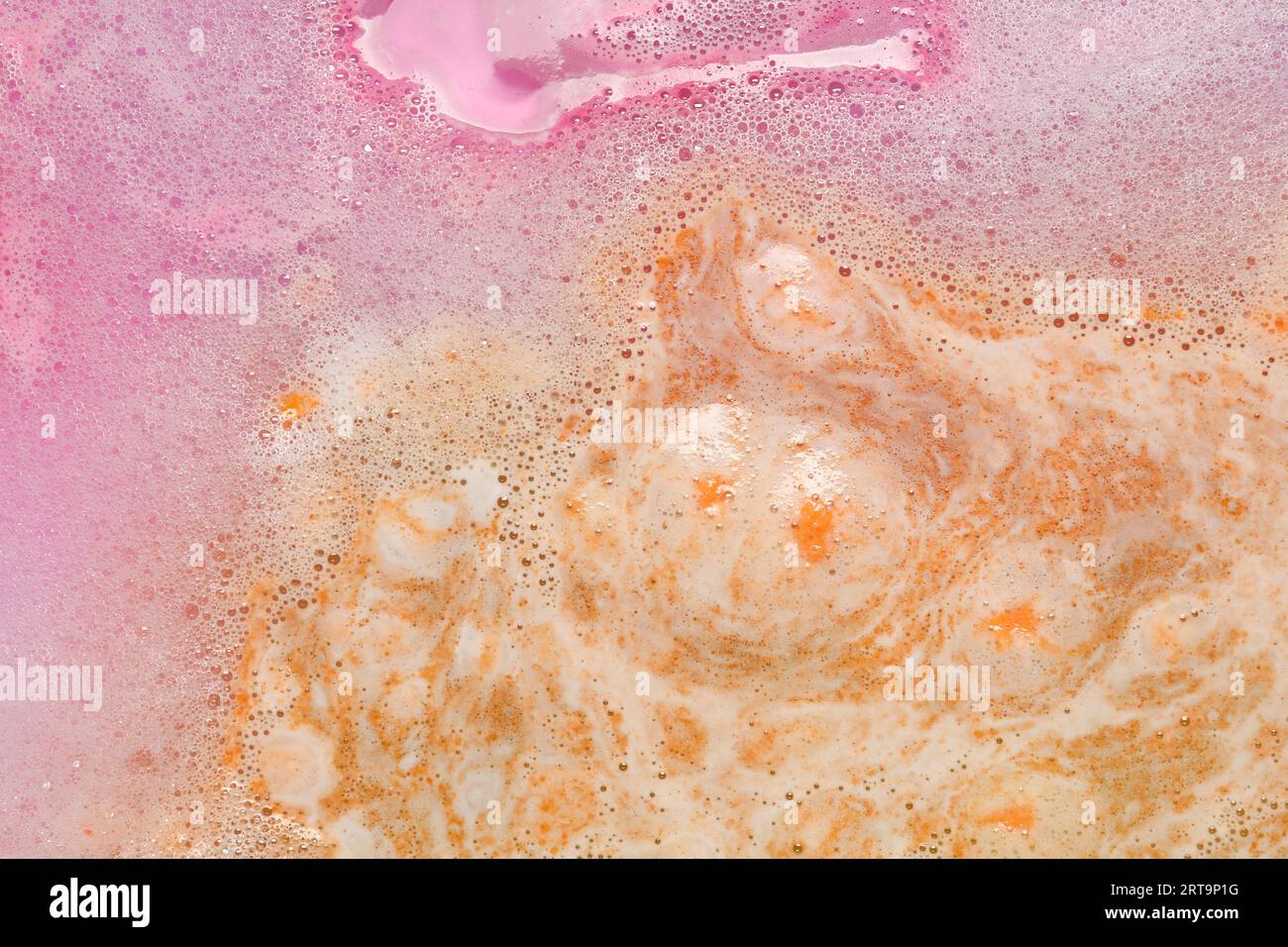 Colorful foam after dissolving bath bomb in water, closeup Stock Photo ...