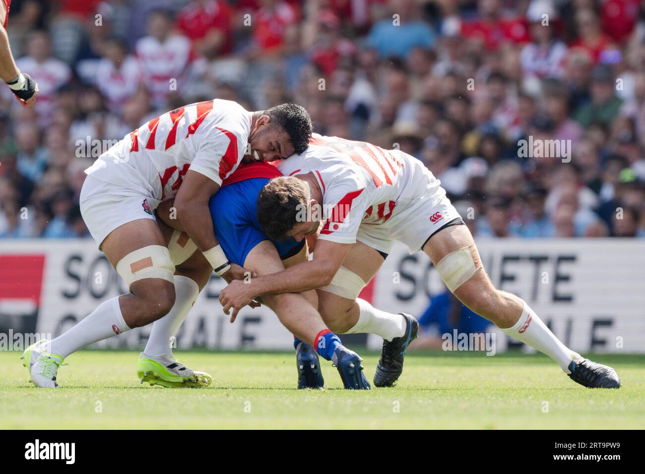 Japan's Amanaki Saumaki (L) and Japan's Jack Cornelsen (R) during the ...
