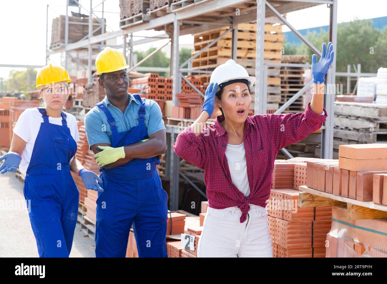 Taskmaster amazed by something in outdoor warehouse Stock Photo - Alamy