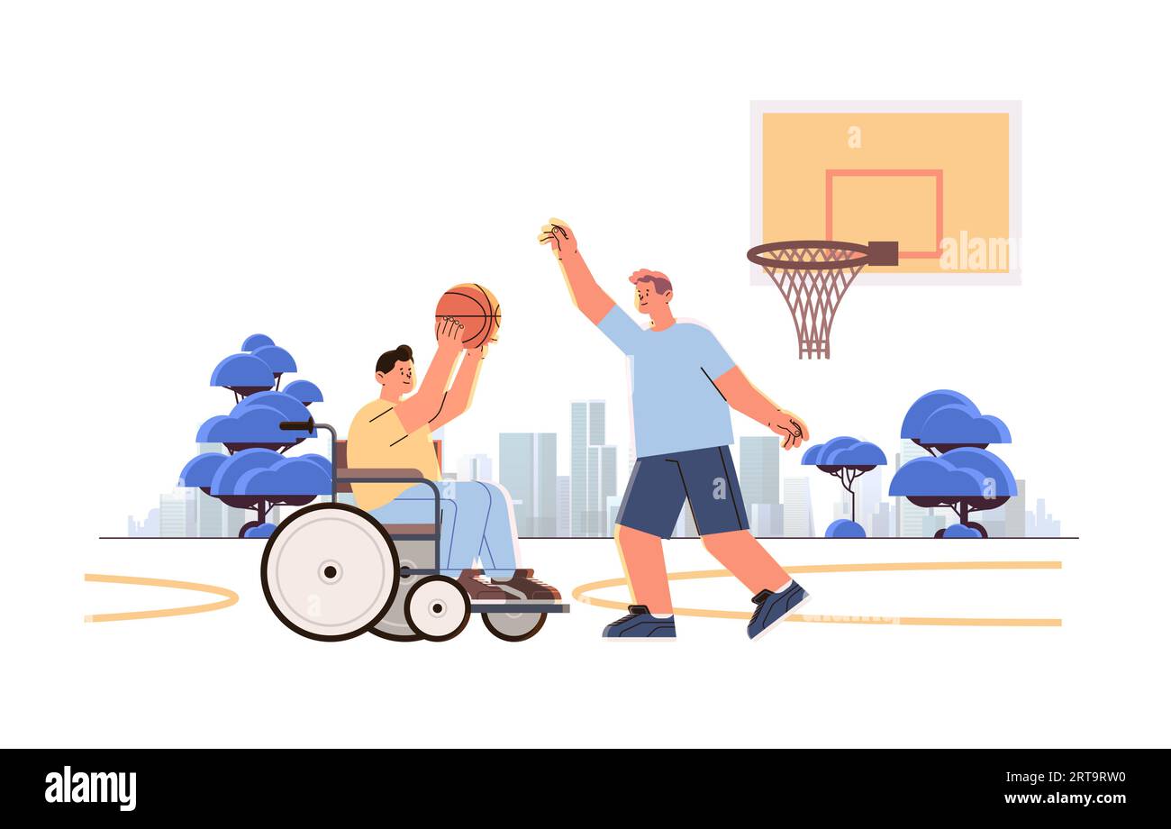 disabled man sitting in wheelchair and playing basketball with male ...