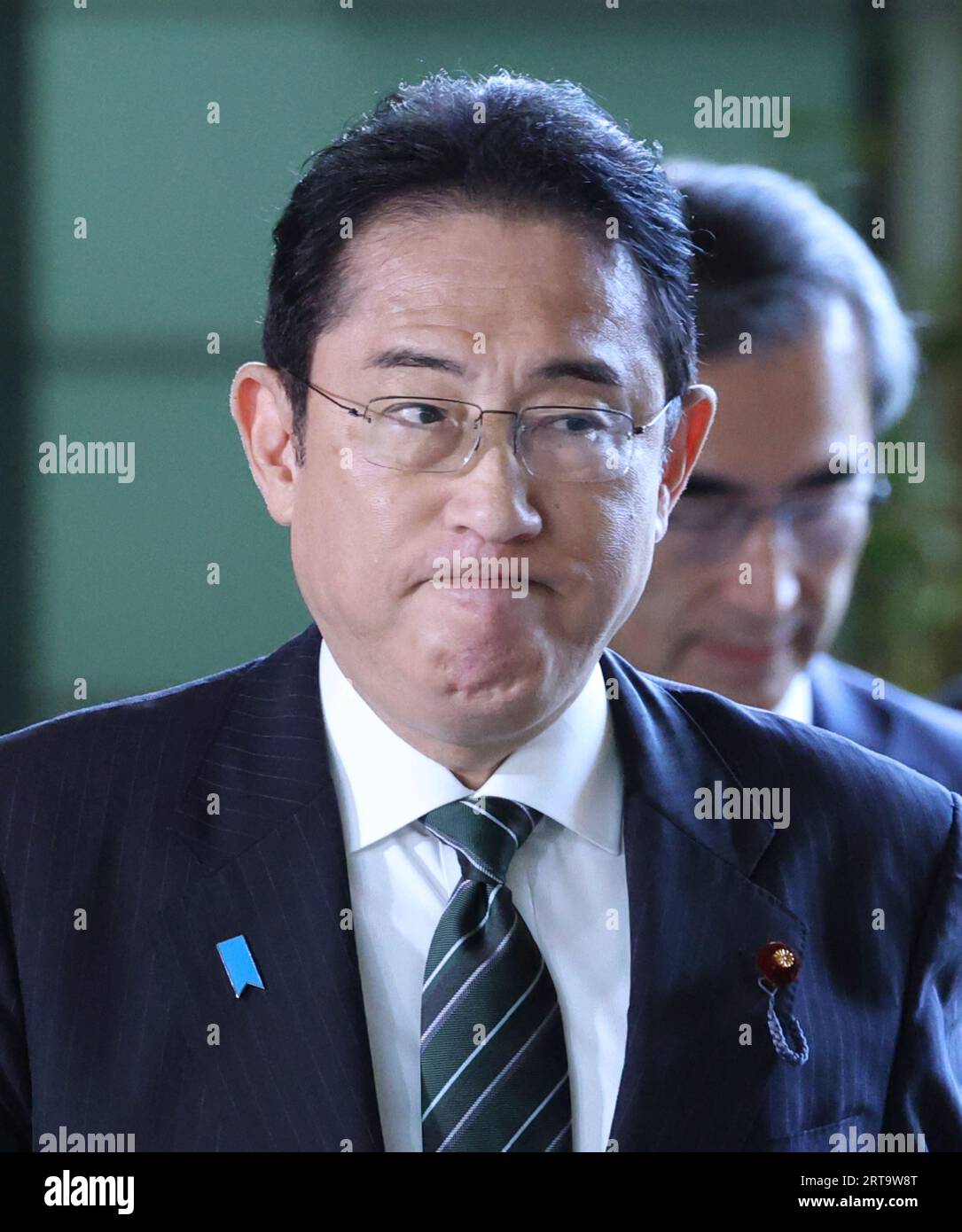 Japanese Prime Minister Fumio Kishida arrives at prime minister's office in Tokyo on September ...