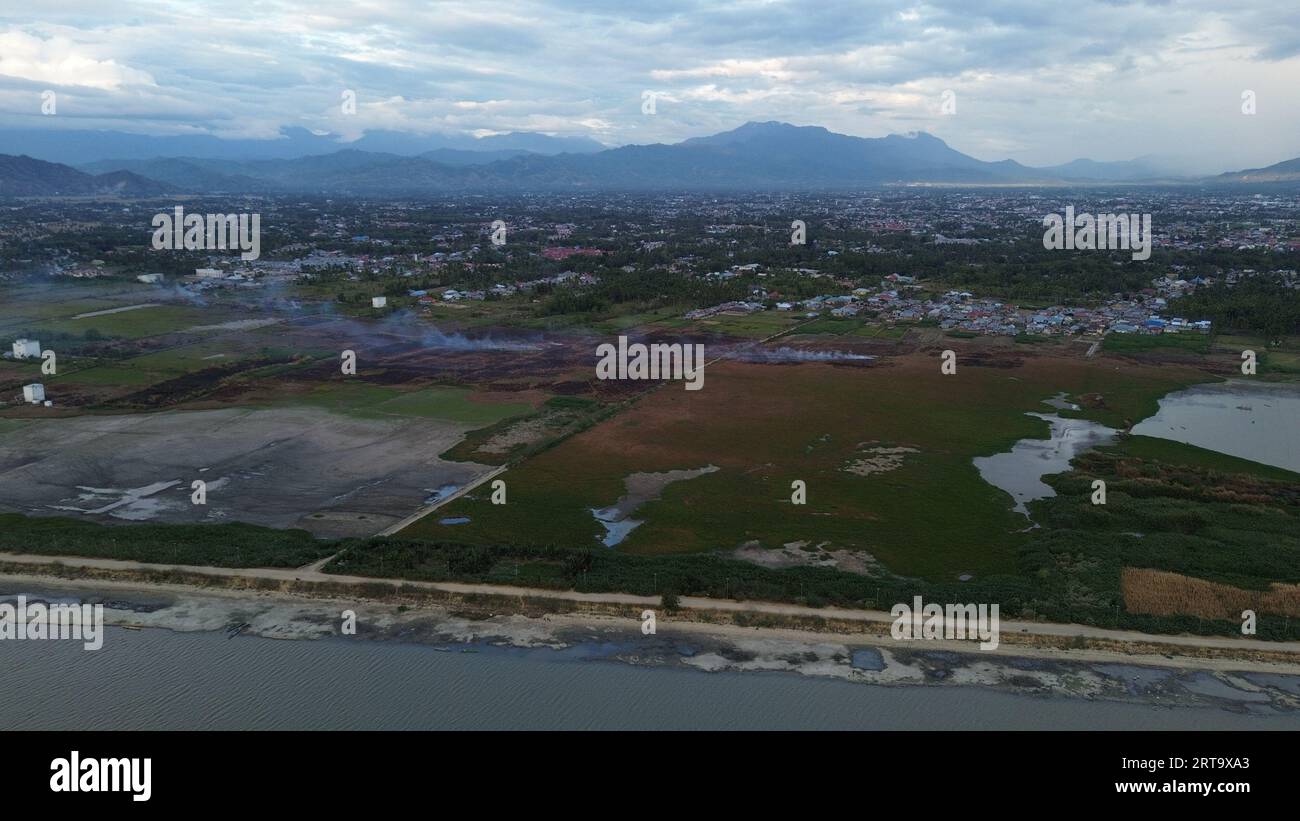 aerial view of land fire on the edge of Lake Limboto Stock Photo - Alamy